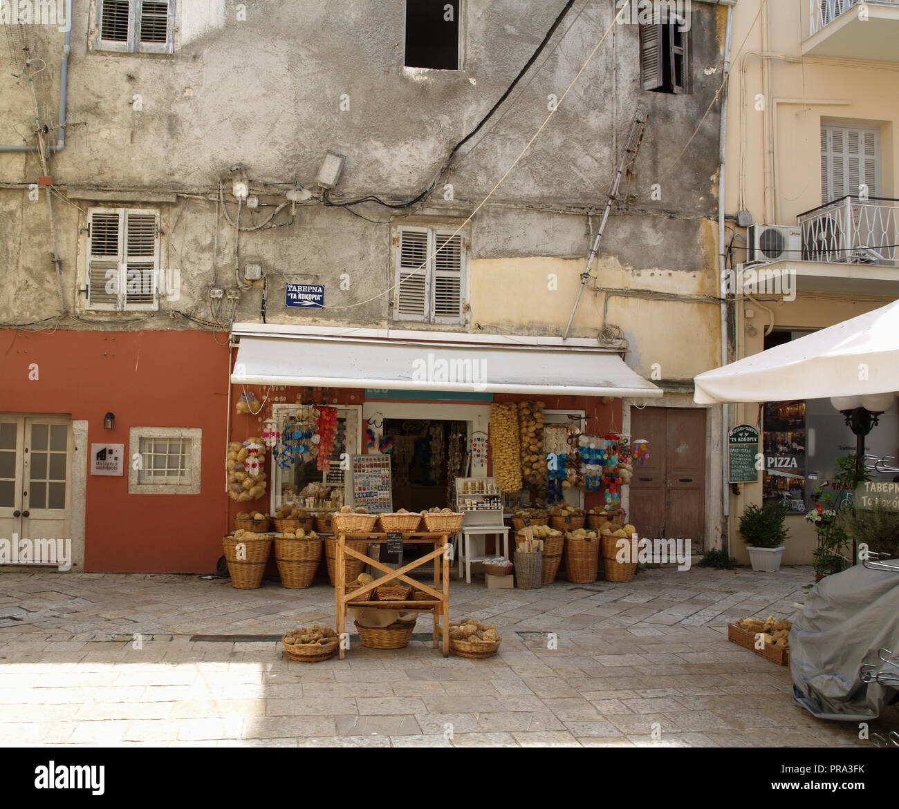 Traditional tourist shop in back streets and alley ways of old Corfu ...