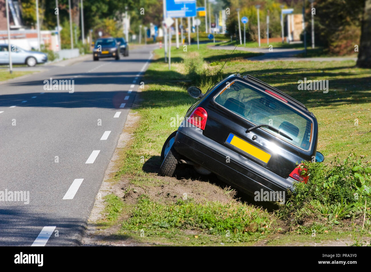 A car had driven into a ditch Stock Photo - Alamy
