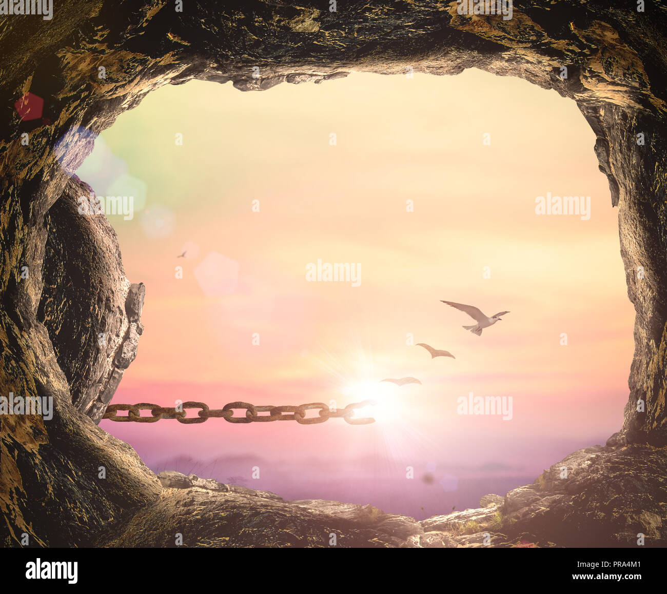 Silhouette birds flying and broken chains at empty tomb stone autumn ...