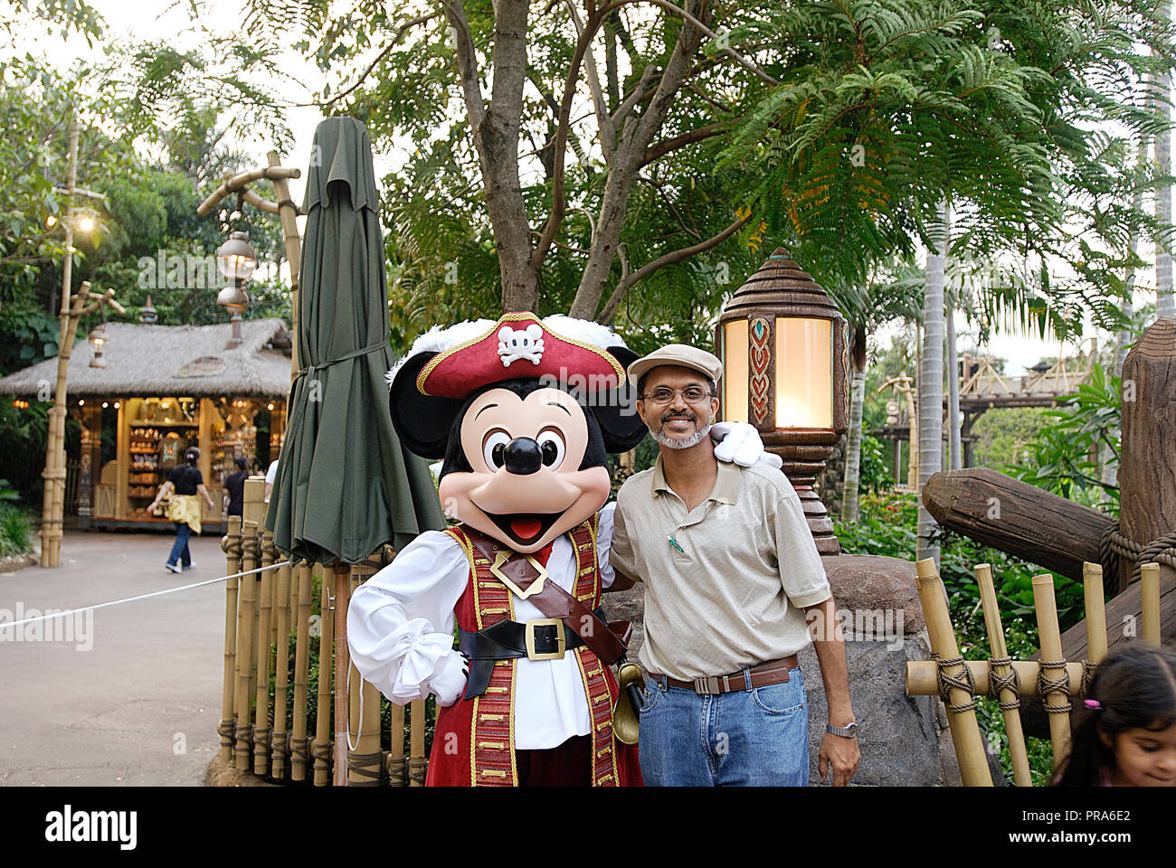 A TOURIST TAKING A PORTRAIT WITH PIRATE MICKEY MOUSE IN HONG KONG ...