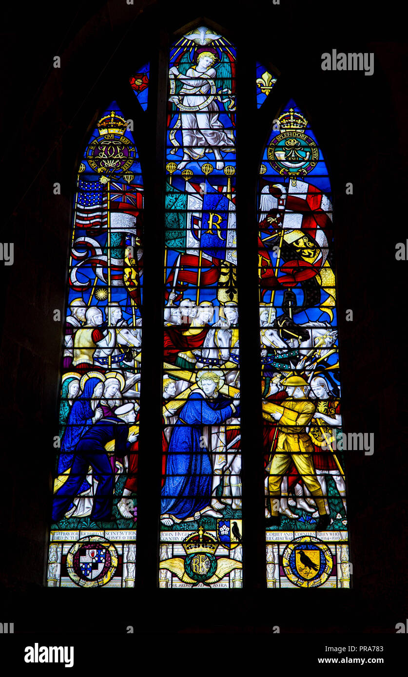 Stained Glass depicting servicemen assiting Jesus with the cross. St ...
