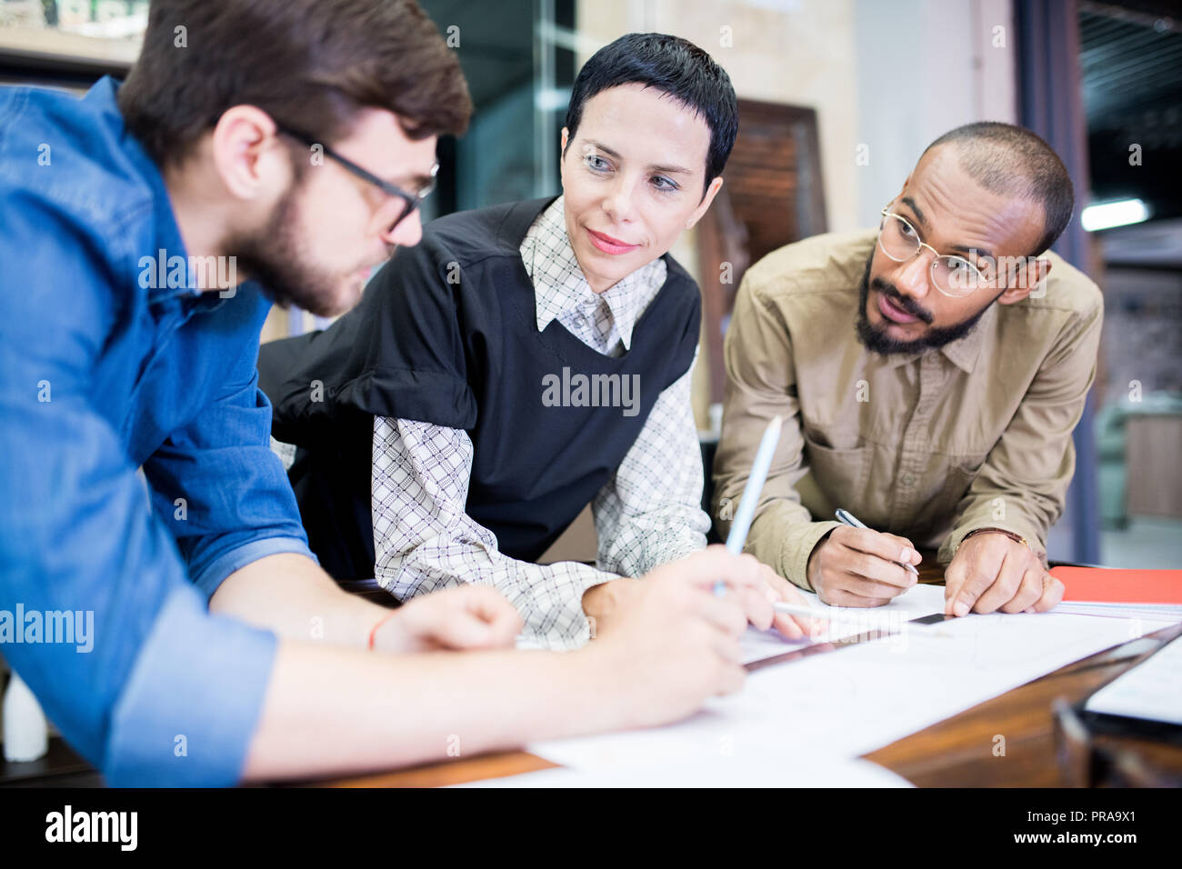 Preparing business project together Stock Photo - Alamy