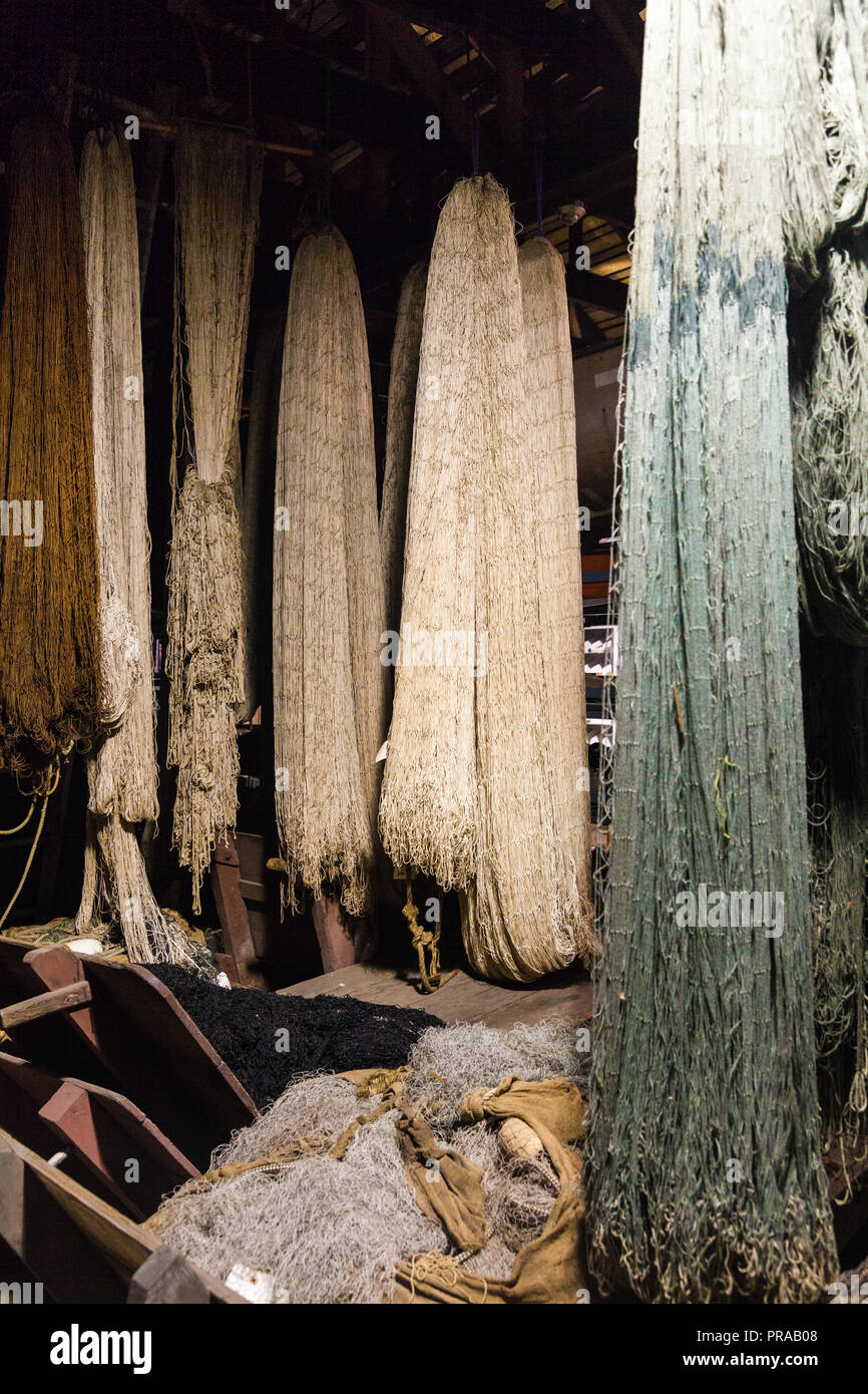 Collection of fishing nets in a museum storage area Stock Photo - Alamy