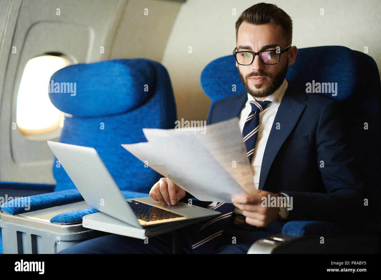 Working in plane hi-res stock photography and images - Alamy