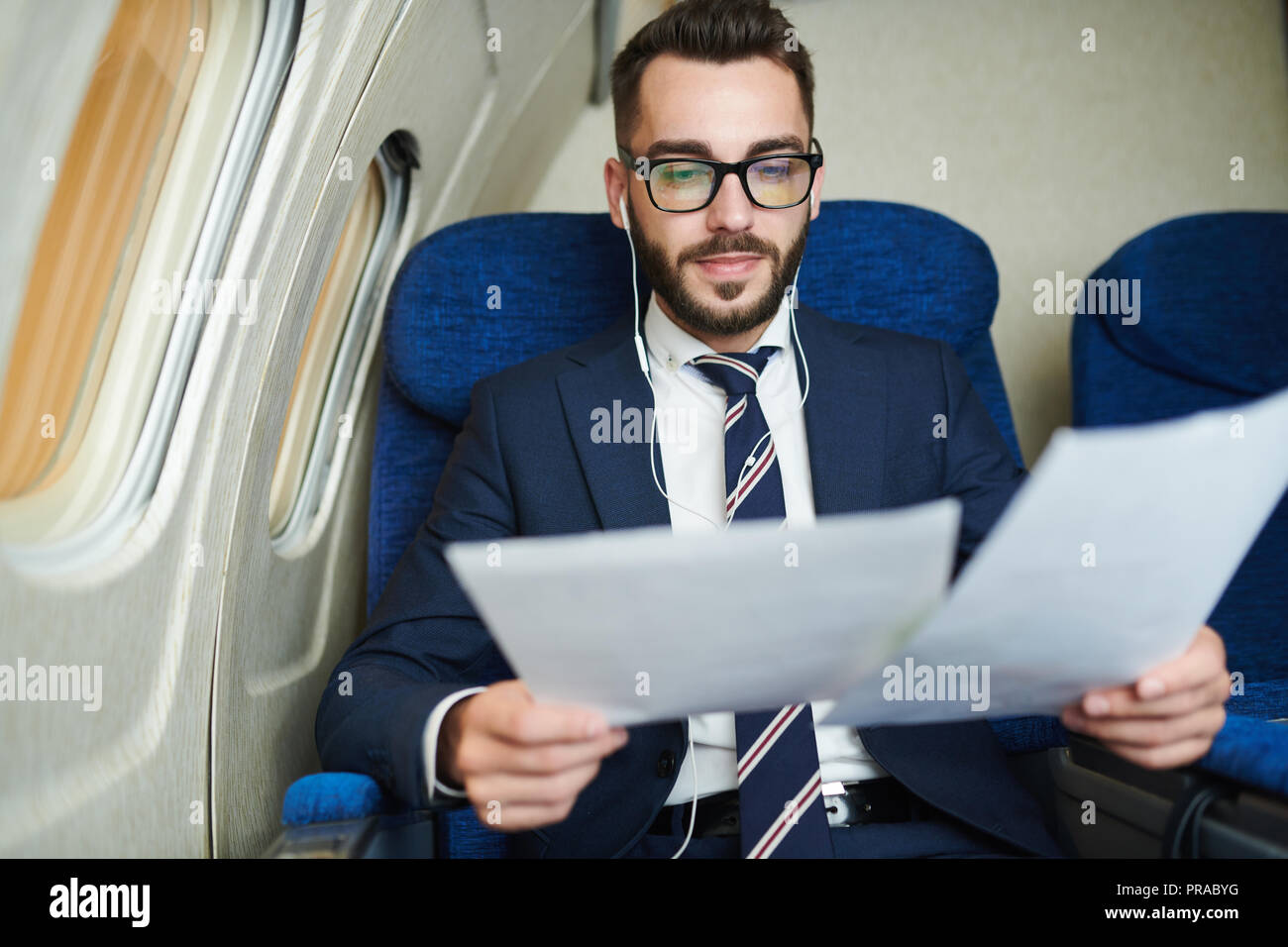 Man first class plane hi-res stock photography and images - Alamy