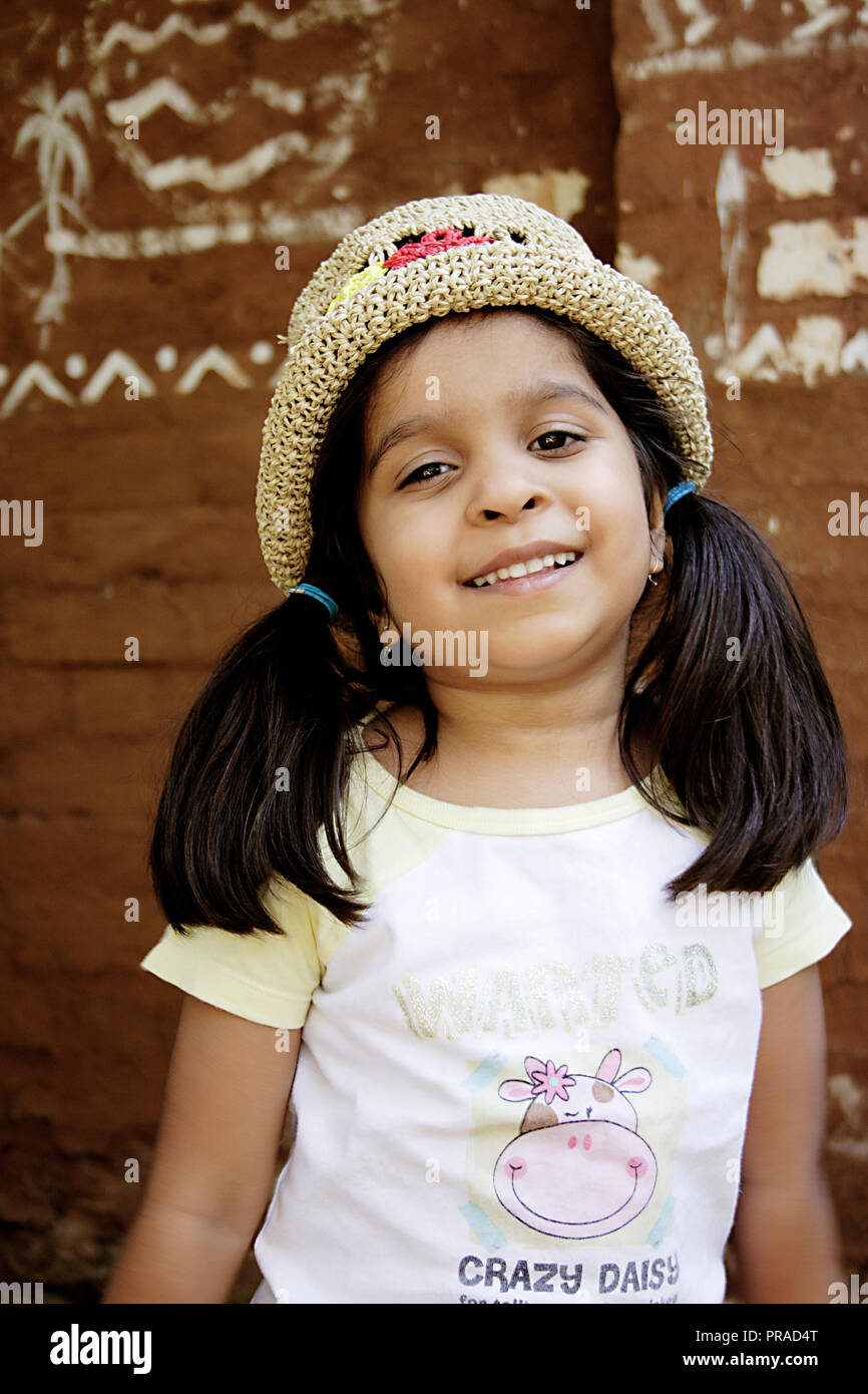 Portrait of a Young girl wearing a cap Stock Photo - Alamy
