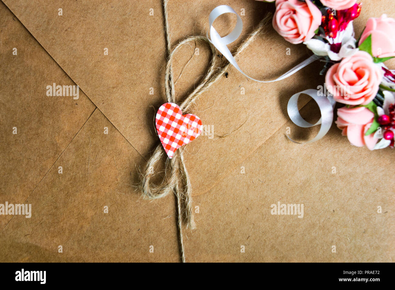 Letter envelope and flower arrangement on white isolated Stock Photo ...