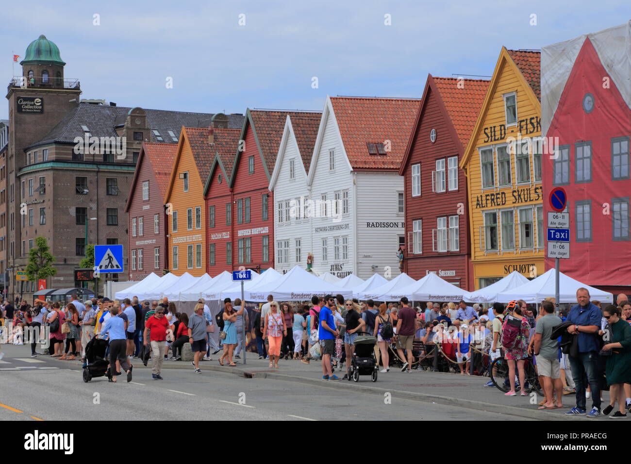 A busy farmer's market on the Hanseatic wharf and World Heritage Site ...