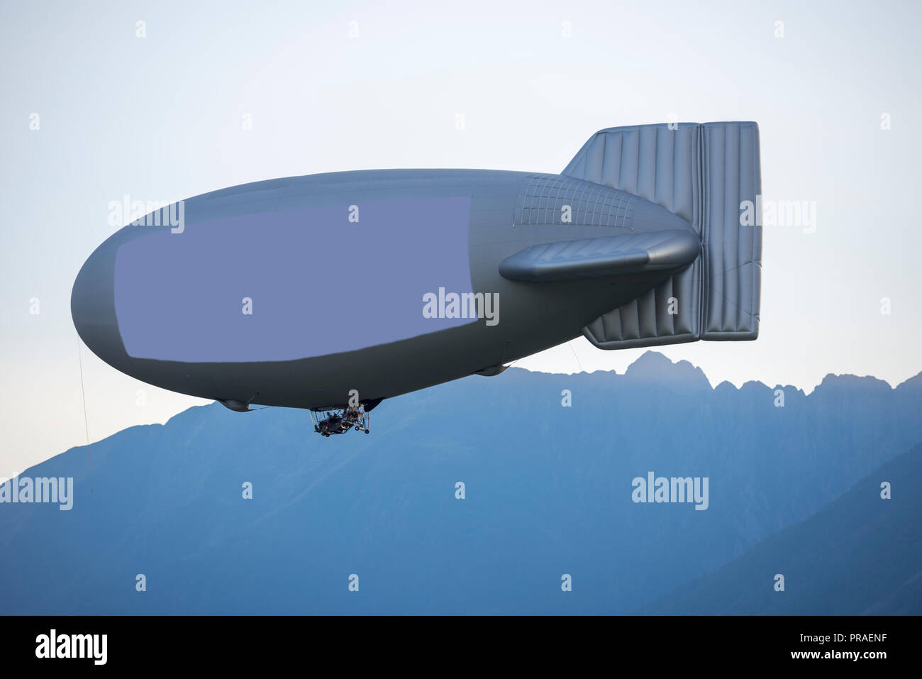 Blimp with Copy Space and Mountain in Switzerland Stock Photo - Alamy
