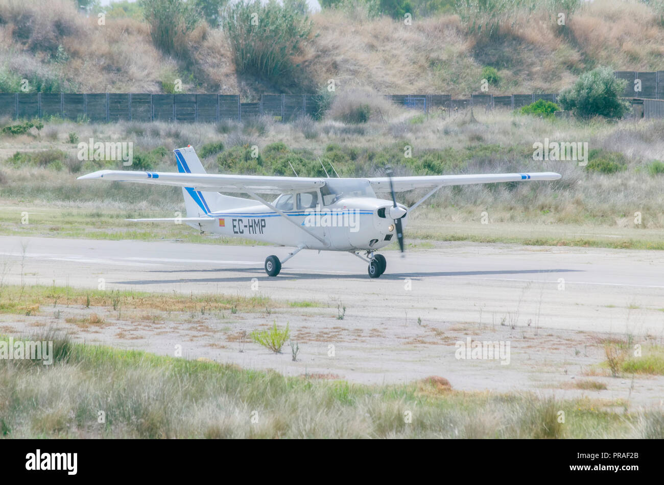 Small aircraft - Cessna 172M Skyhawk II -, running by the runway of ...