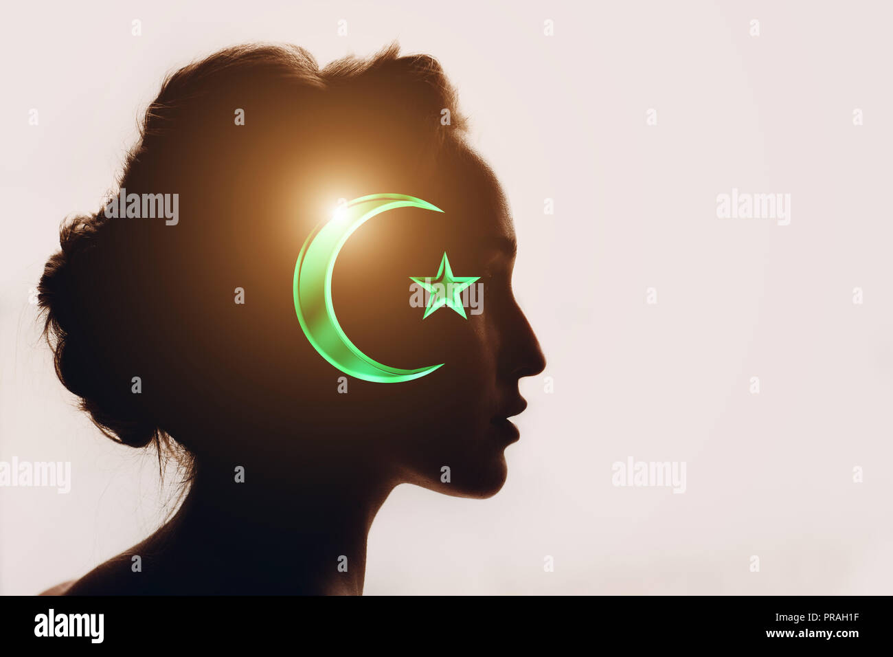 Symbol of Islam concept. Muslim woman. Green moon and star Stock Photo ...