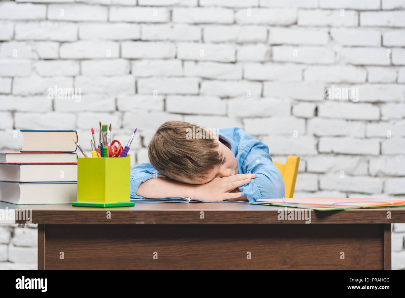 Student or school boy being tired from all the learning Stock Photo - Alamy