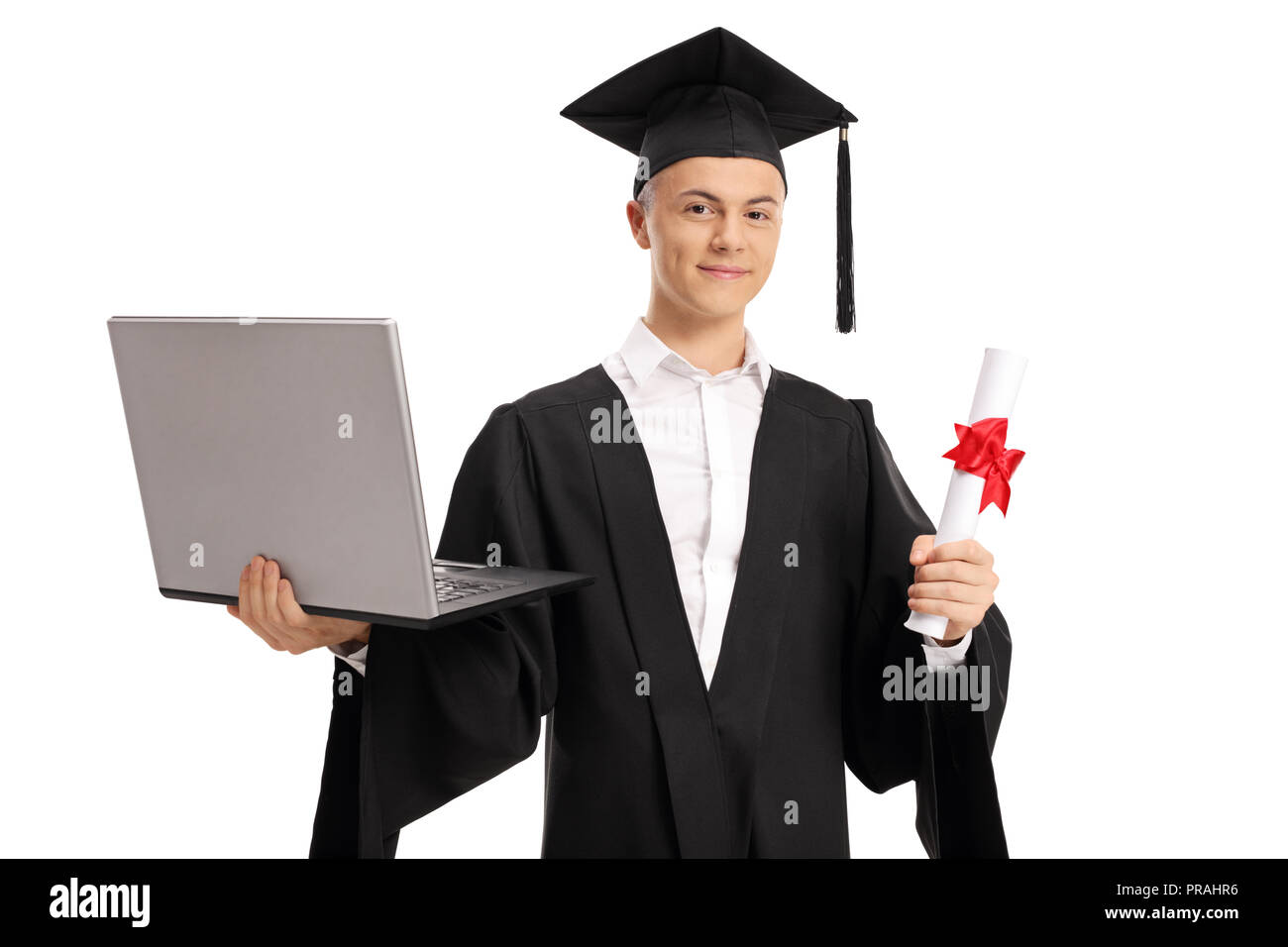 Graduate student holding a laptop and a diploma isolated on white ...