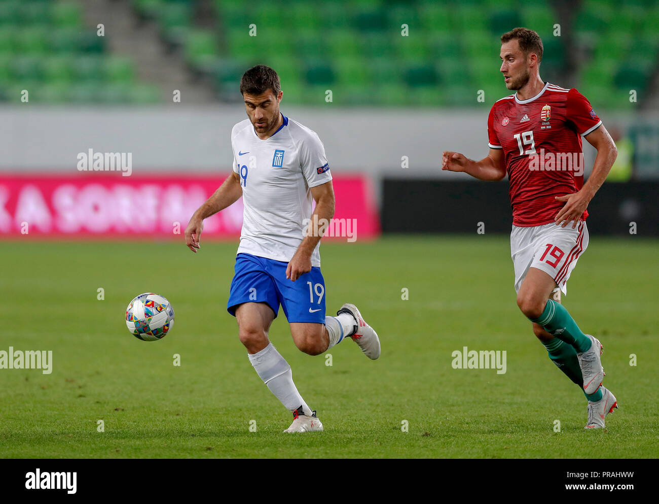 BUDAPEST, HUNGARY - SEPTEMBER 11, 2018: (l-r) Sokratis Papastathopoulos ...