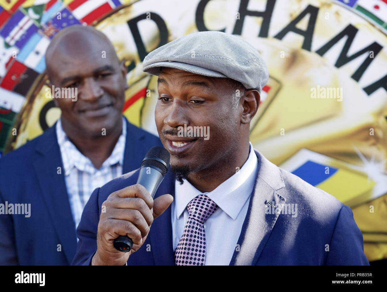 Kiev, Ukraine. 1st Oct, 2018. Former Boxing Champion LENNOX LEWIS (R ...