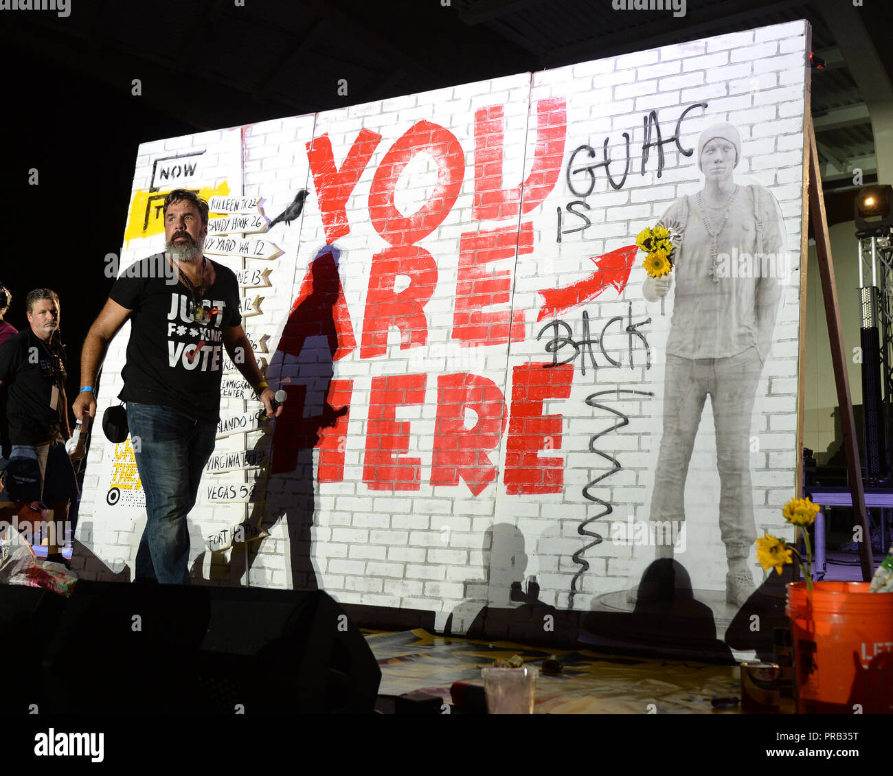 Parkland FL, USA. 30th Sep, 2018. Manuel Oliver paints a mural of his ...