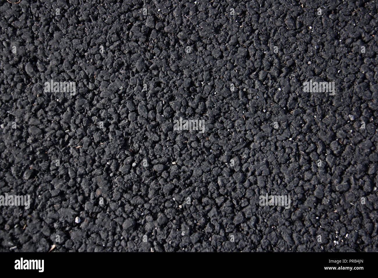black tarmac texture useful as a background Stock Photo - Alamy