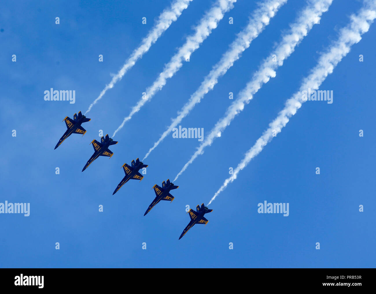 Four F/A-18 Hornets with the U.S. Navy Blue Angels demonstration team ...