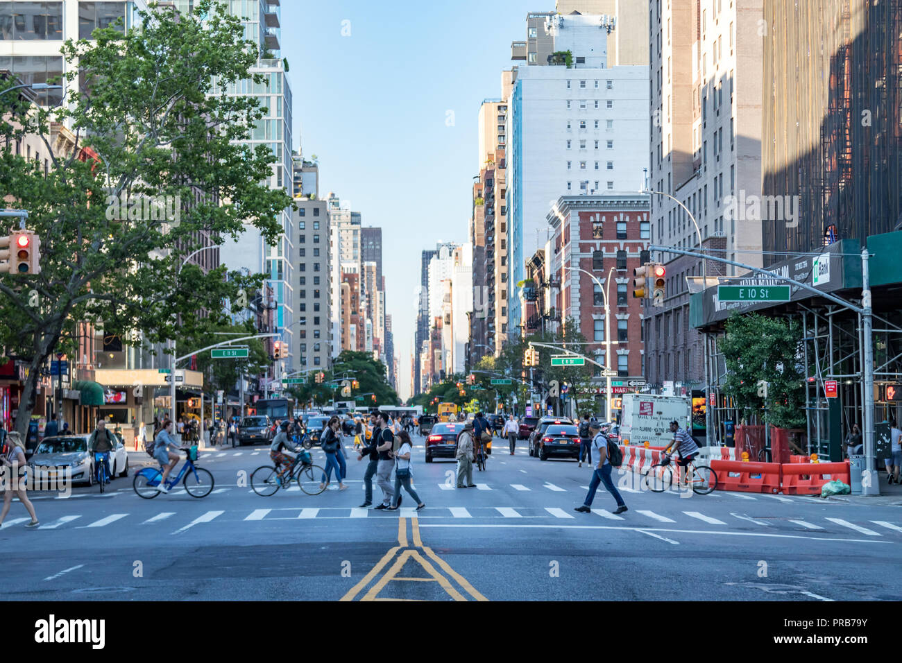 NEW YORK CITY - CIRCA 2018: Crowds of people walk across the busy ...