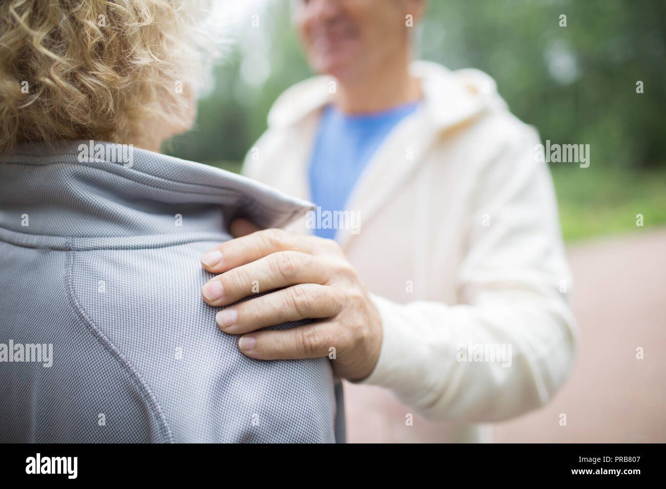 Comforting woman shoulder hi-res stock photography and images - Alamy