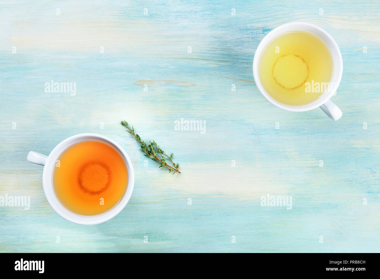 An overhead photo of tea, on a teal background with copy space Stock ...