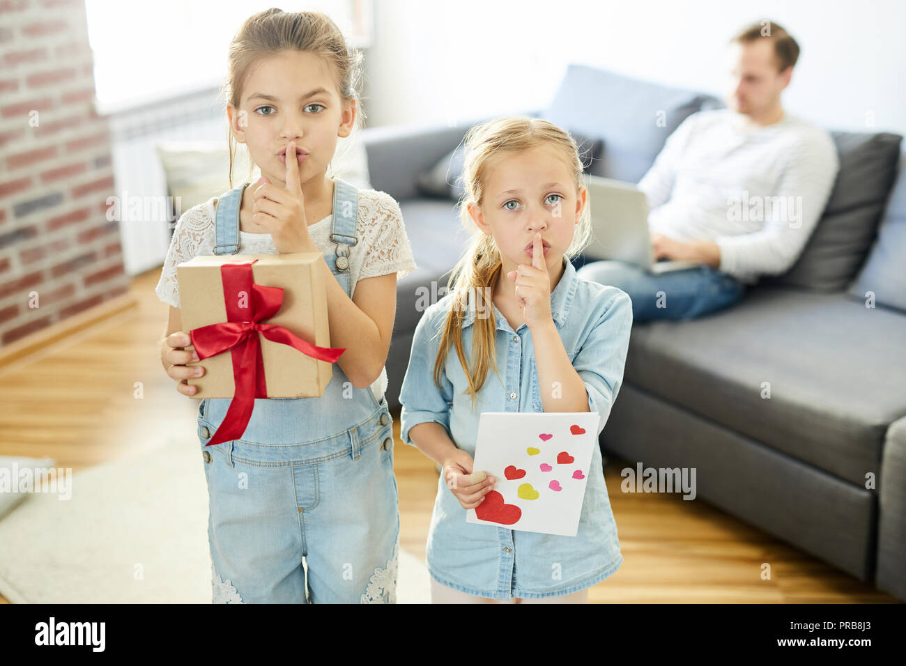 Two little girls prepared surprises for their dad and making shh ...