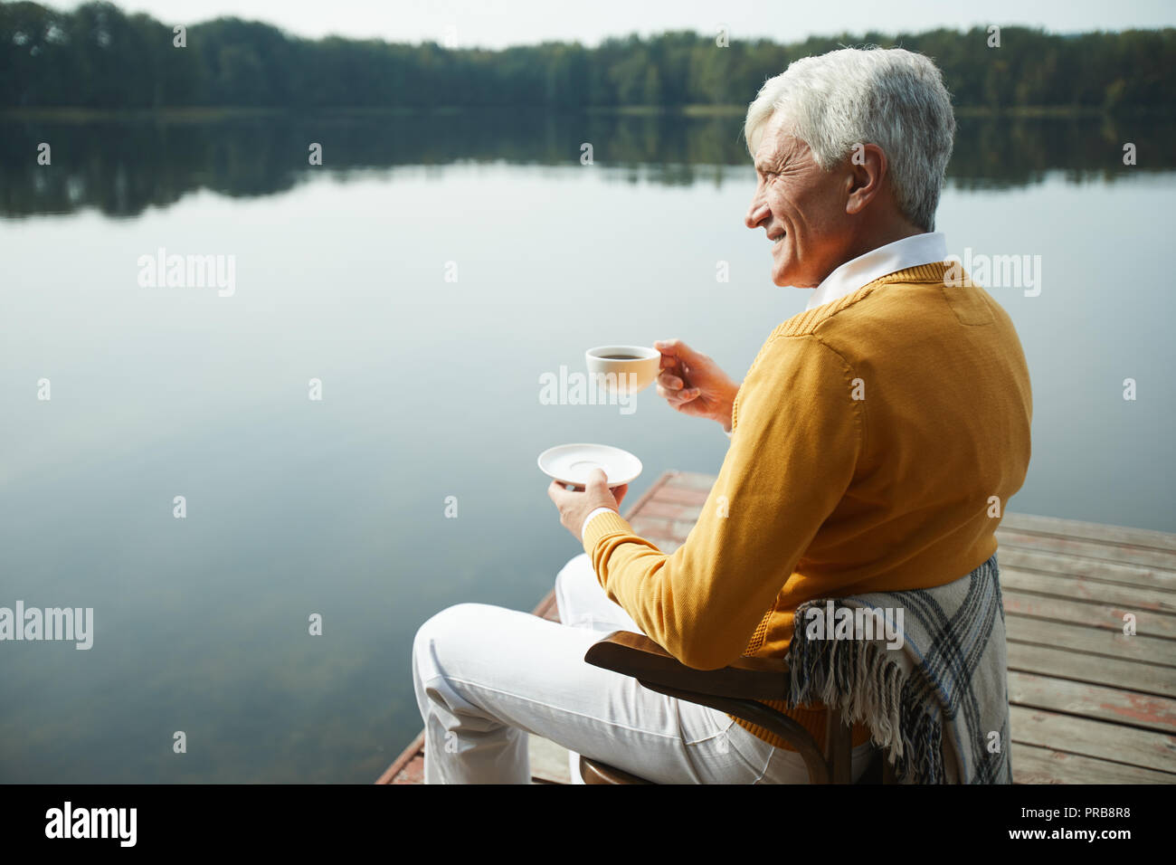 Mature adult chair and blanket hi-res stock photography and images - Alamy