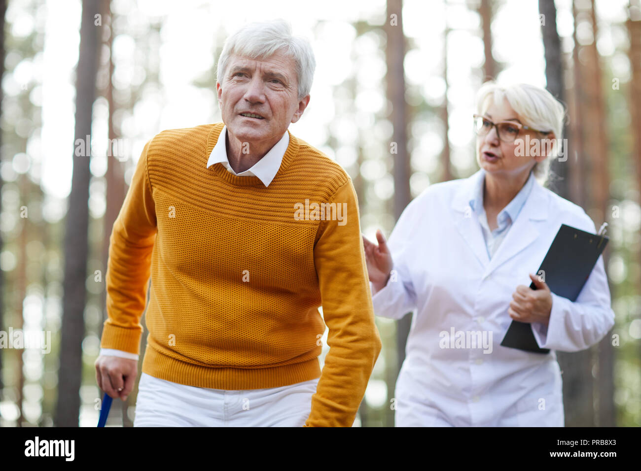 Man using walking stick hi-res stock photography and images - Alamy