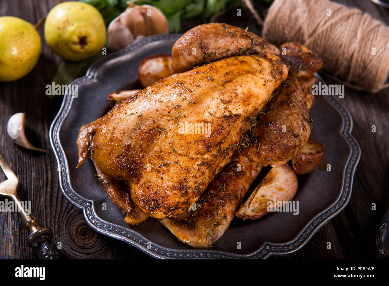 Roasted guinea fowl Stock Photo - Alamy