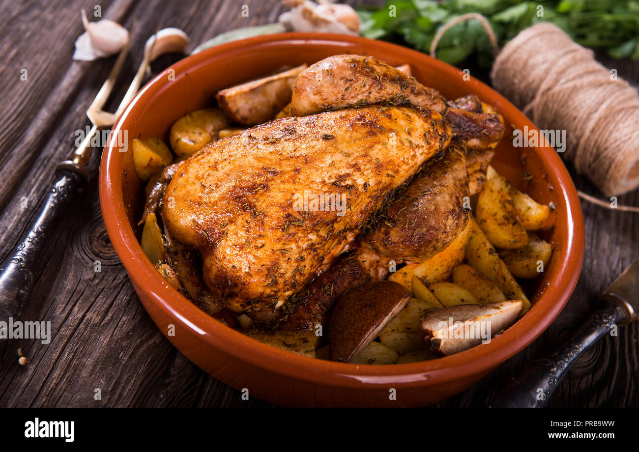 Roasted guinea fowl Stock Photo - Alamy