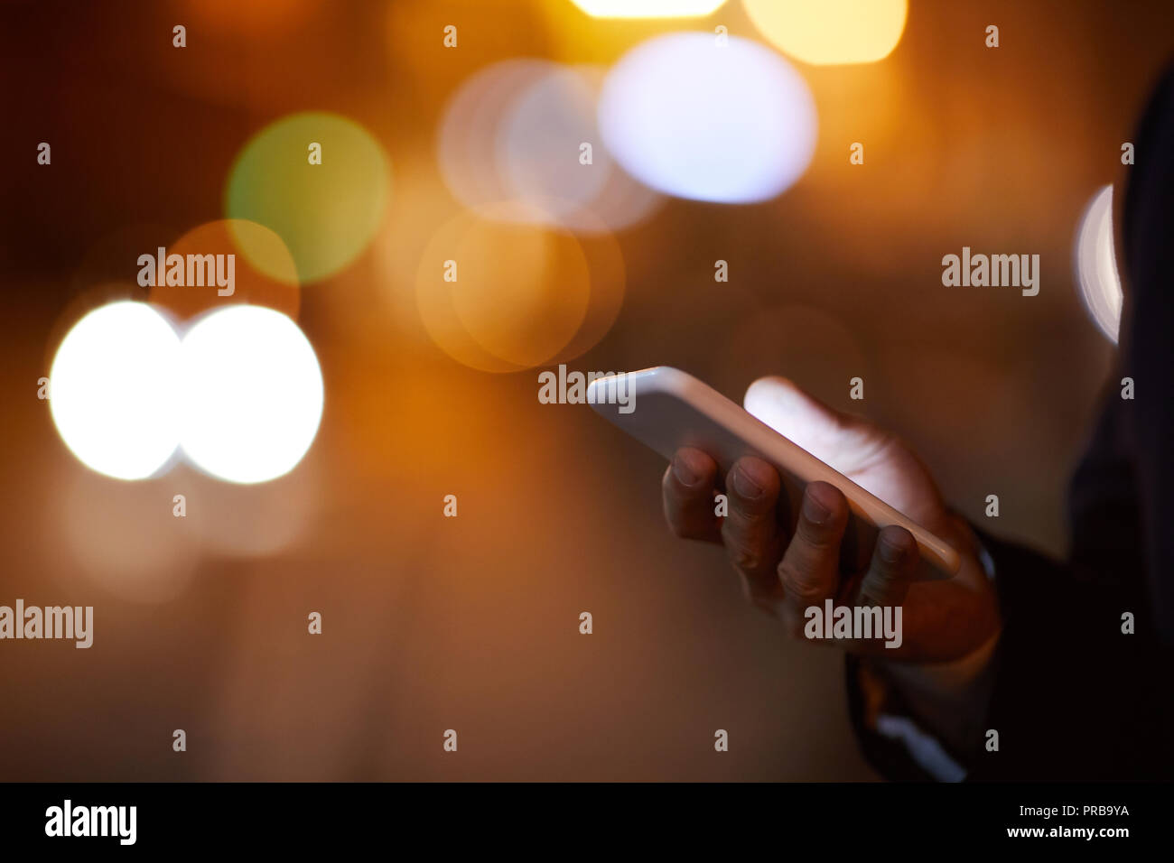 Hand of mobile businessman holding modern gadget while communicating ...
