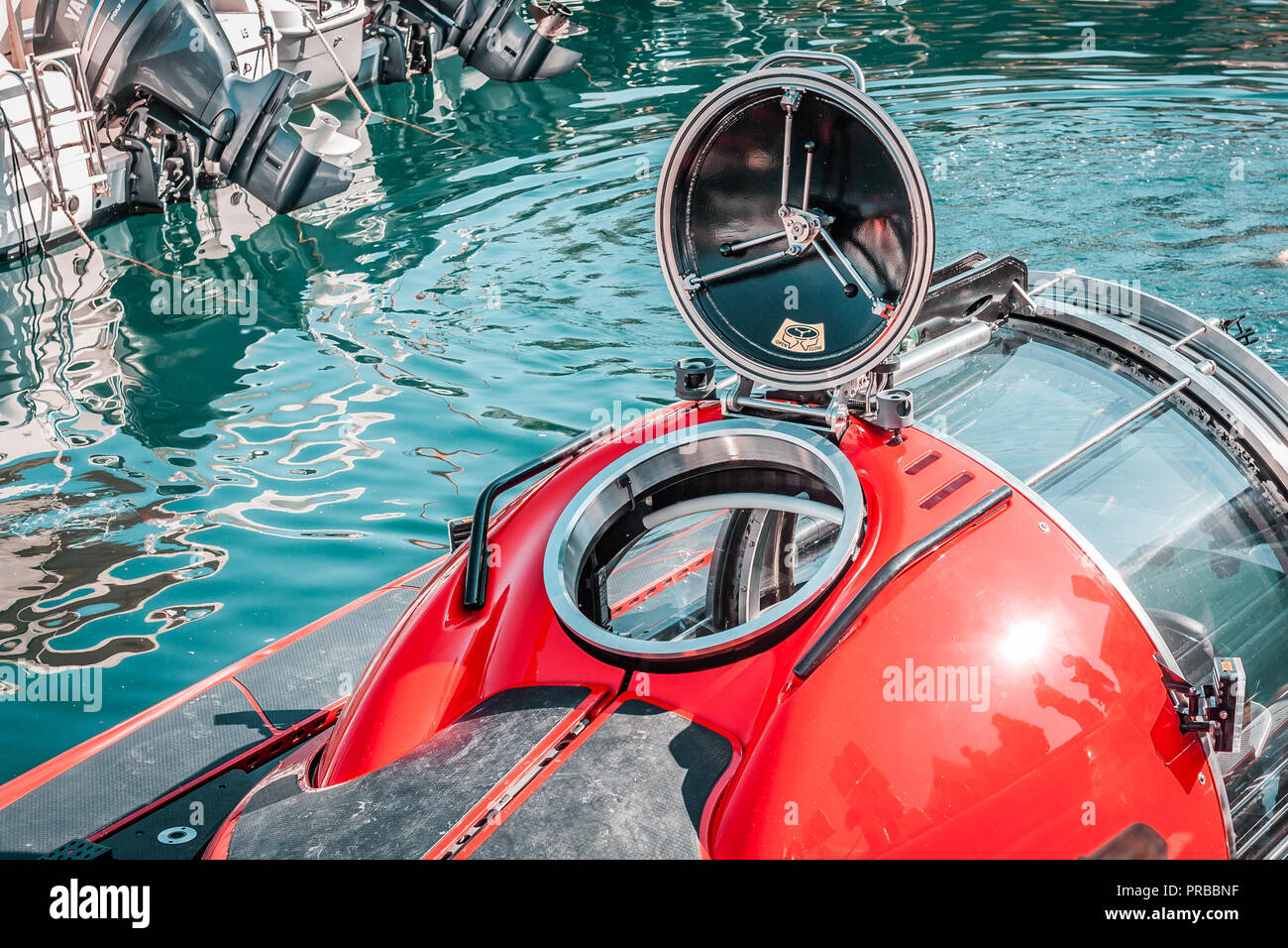 Small submarine, red color. Round hatch, scuba diving, underwater ...