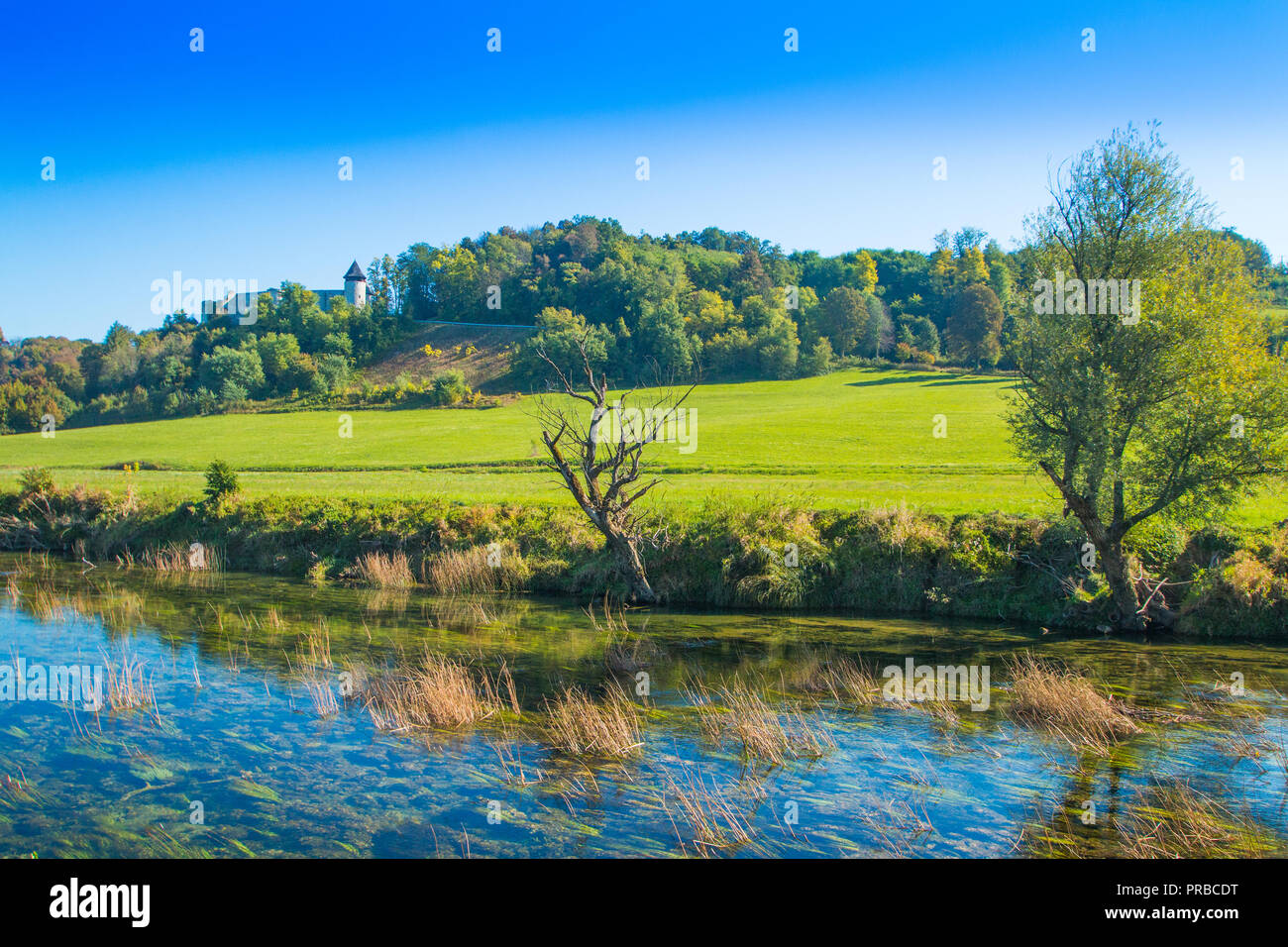 Croatia, countryside landscape, river Dobra and old fortress in ...