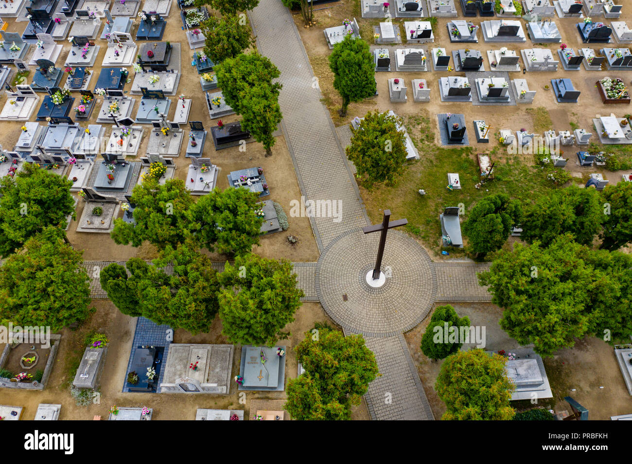 Cemetery tombs and cross, view from above Stock Photo - Alamy