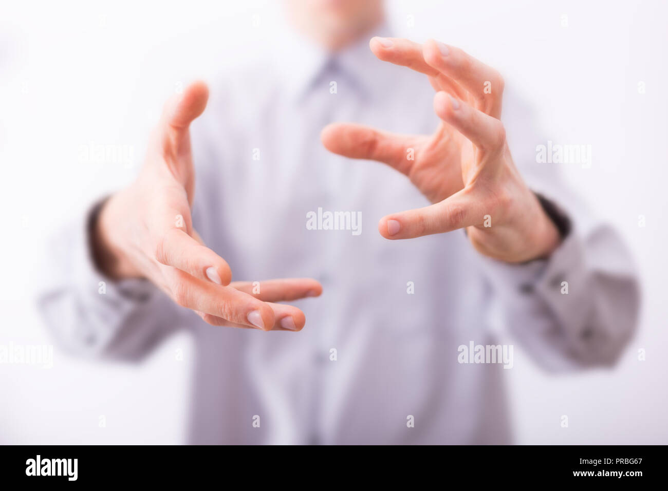 Hands reaching catching hi-res stock photography and images - Alamy