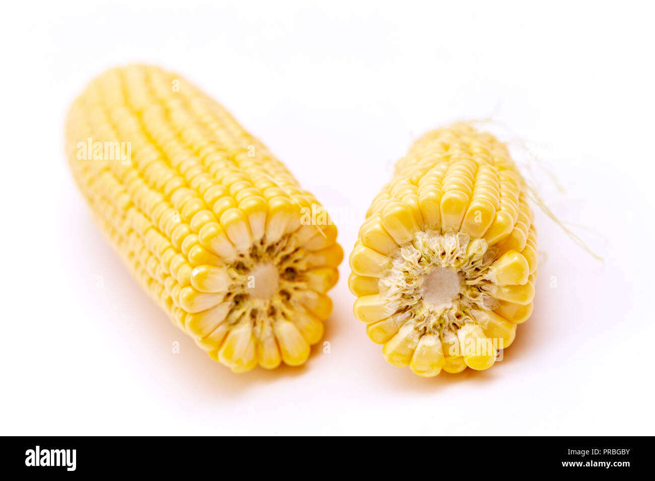 Broken corn cobs isolated on white Stock Photo - Alamy
