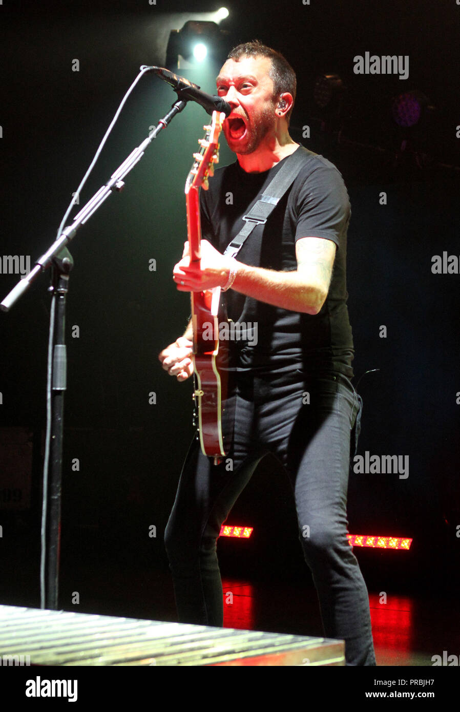 Tim Mcllrath with Rise Against performs at the Sunset Cove Amphitheater ...