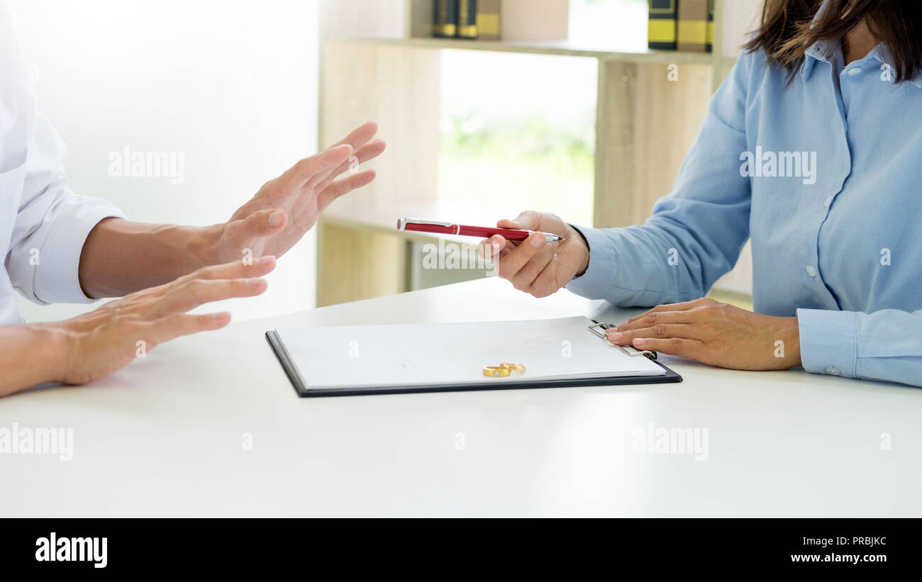 Closeup of a man do not want to Signing Contract or premarital ...