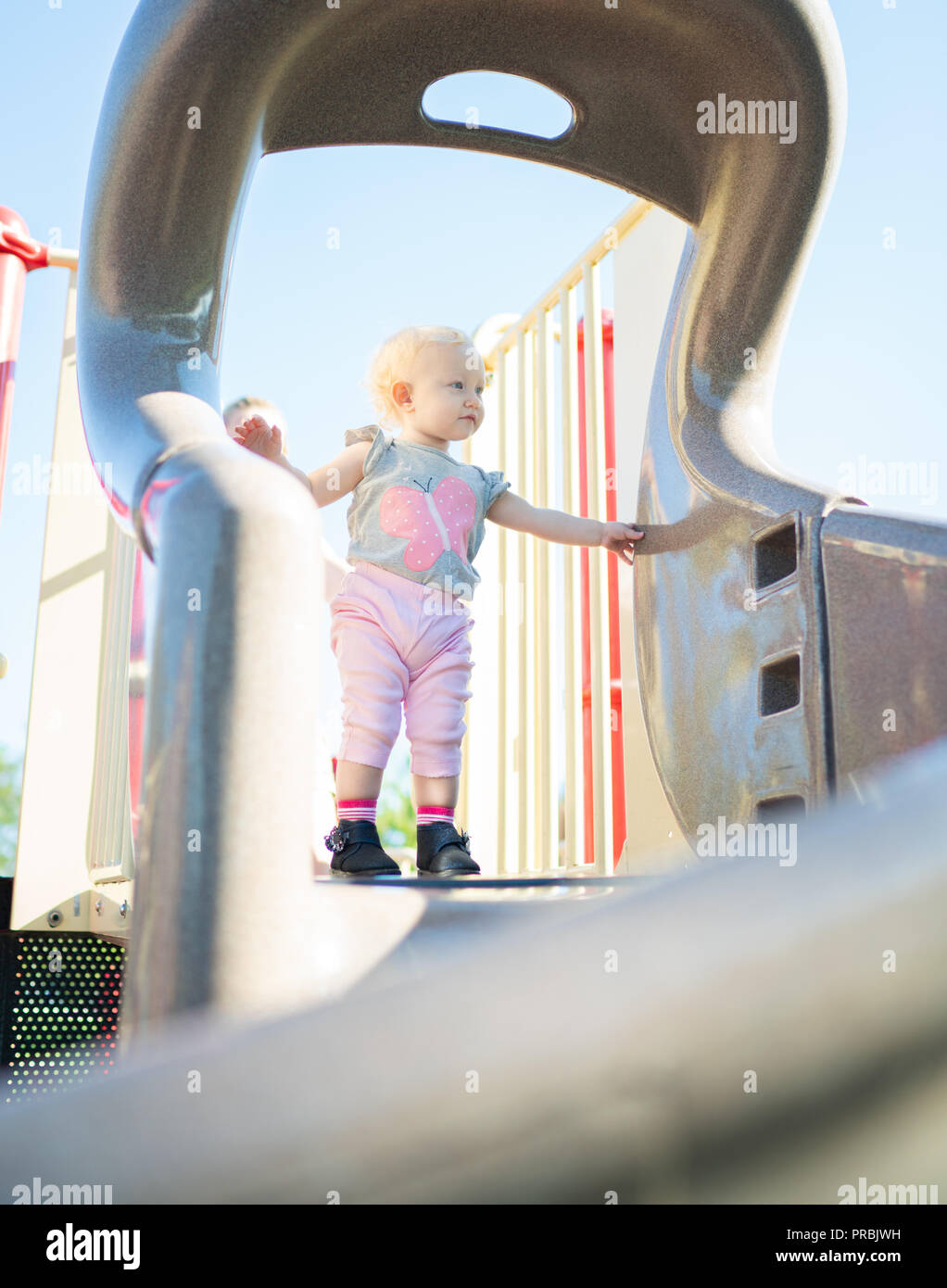 Children playing at playground Stock Photo - Alamy