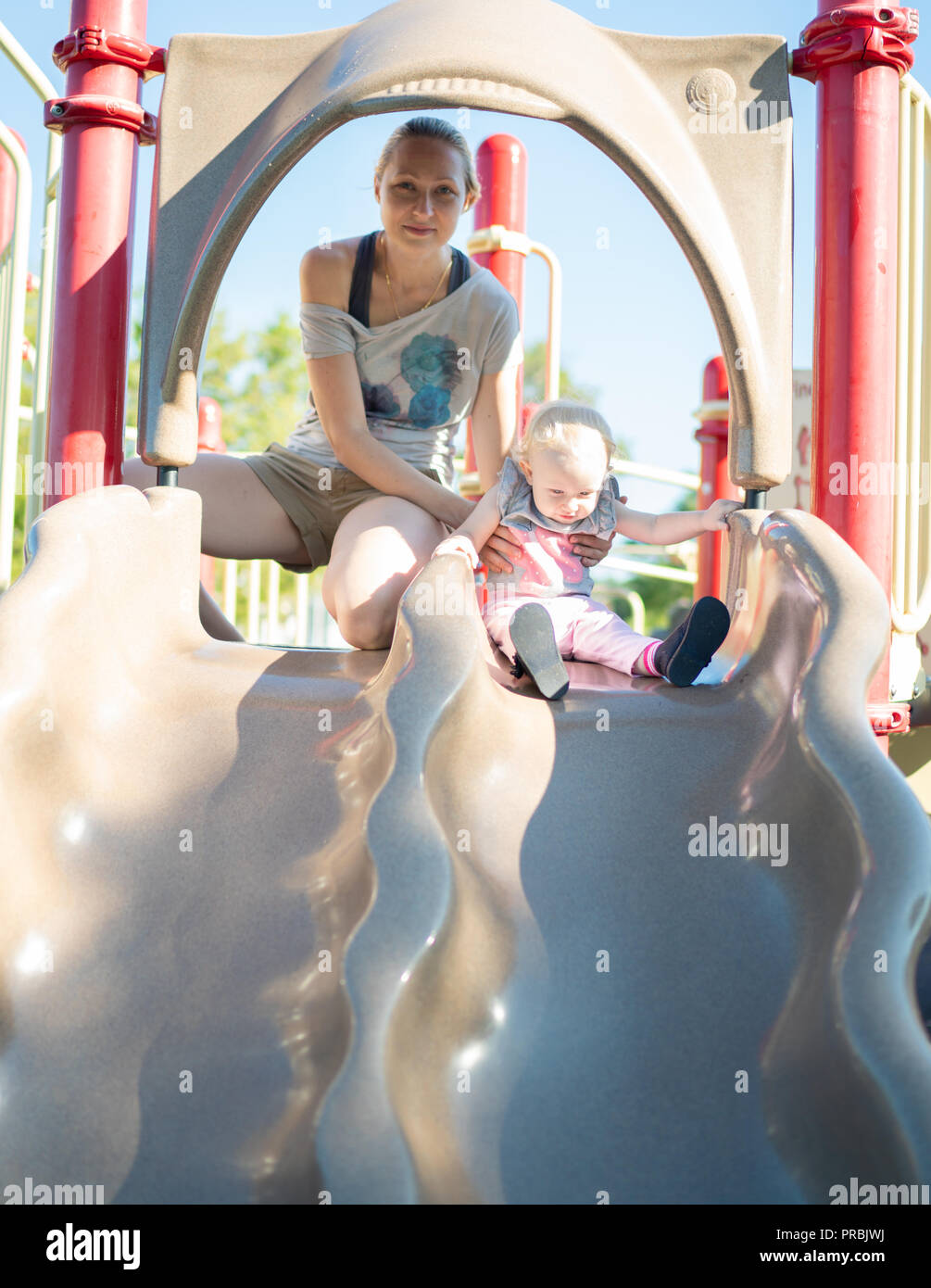 Children playing at playground Stock Photo - Alamy