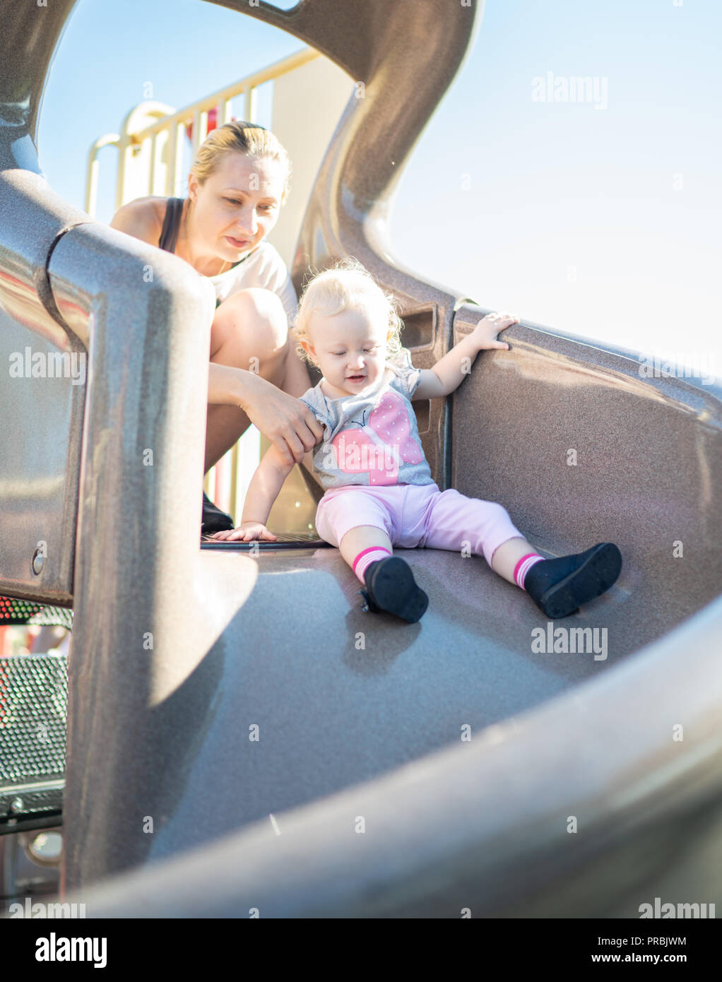 Children playing at playground Stock Photo - Alamy