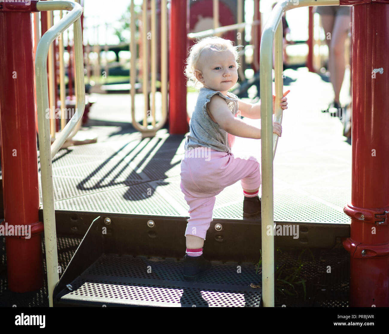 Children playing at playground Stock Photo - Alamy