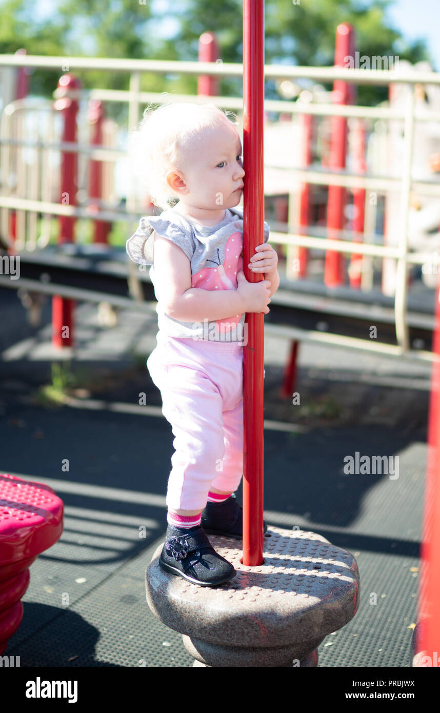 Children playing at playground Stock Photo - Alamy