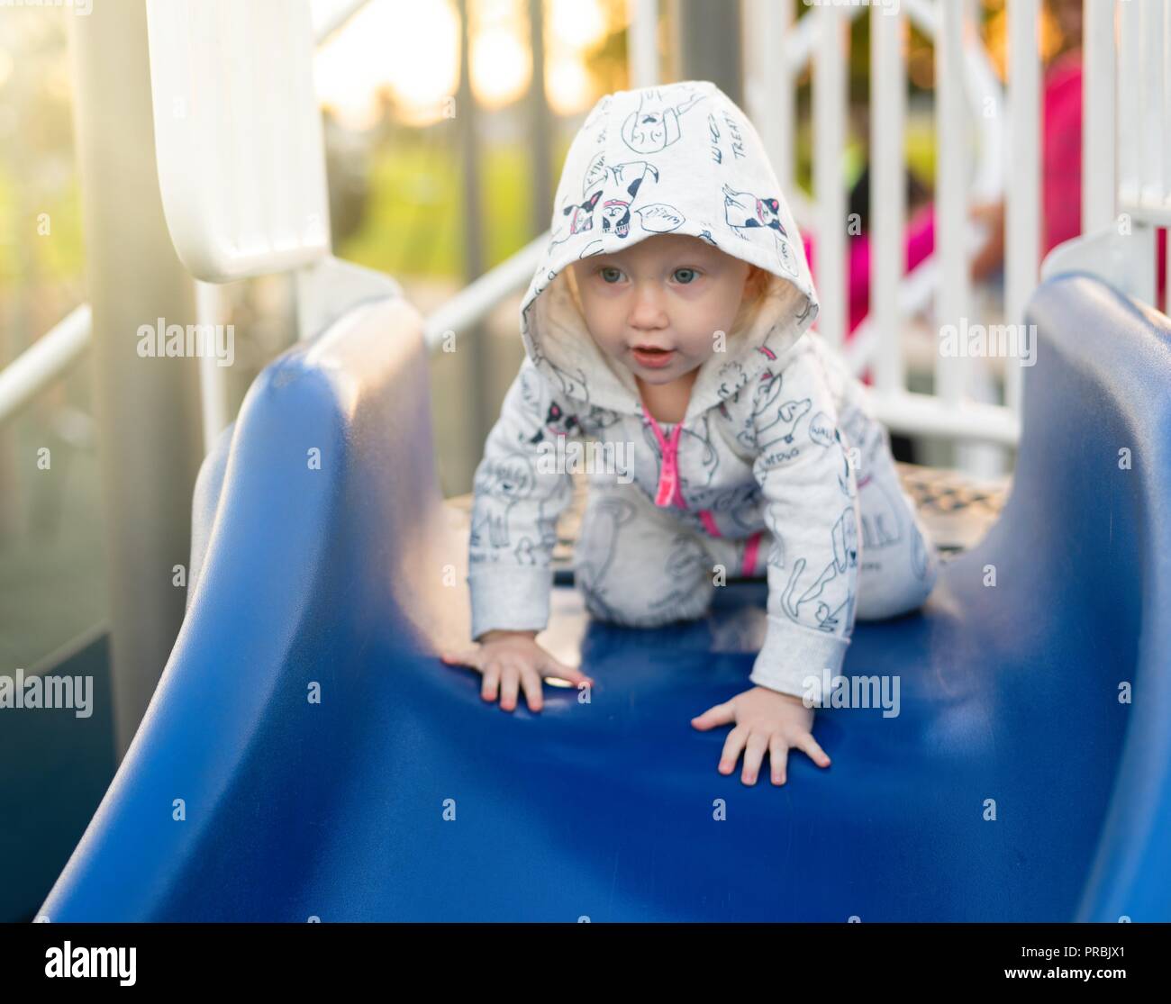 Children playing at playground Stock Photo - Alamy