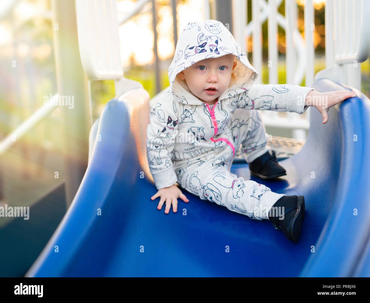Children playing at playground Stock Photo - Alamy