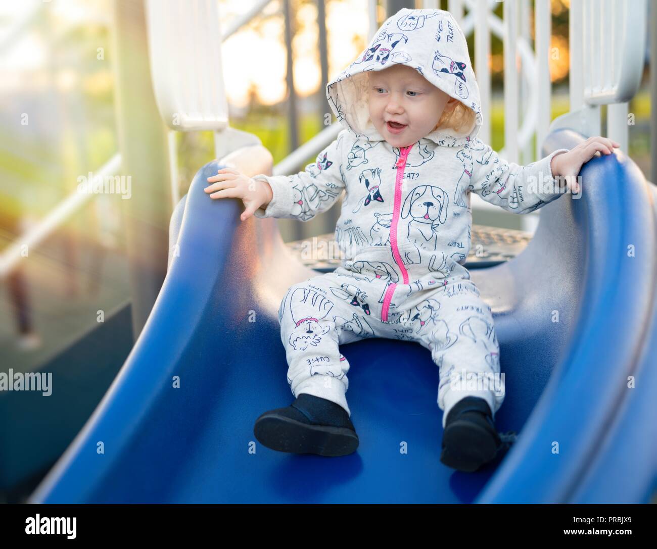 Children playing at playground Stock Photo - Alamy