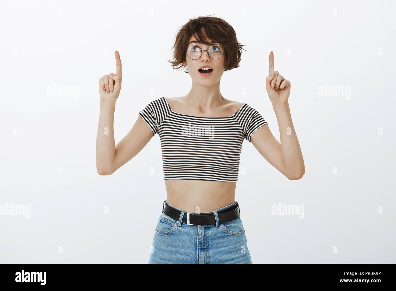 Wow look there. Portrait of curious and impressed intrigued woman in ...