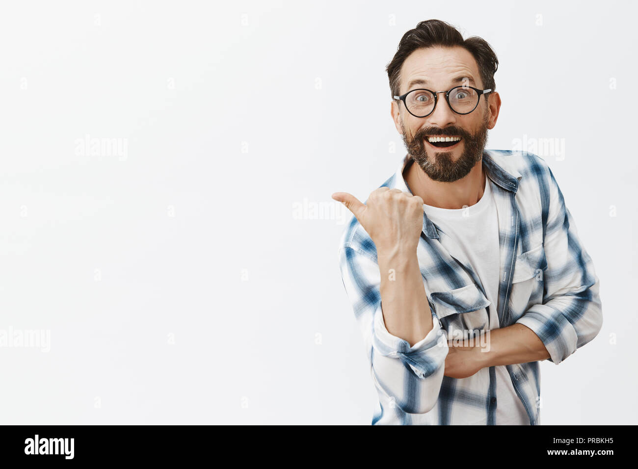 Impressed happy and excited good-looking male scientist in glasses ...