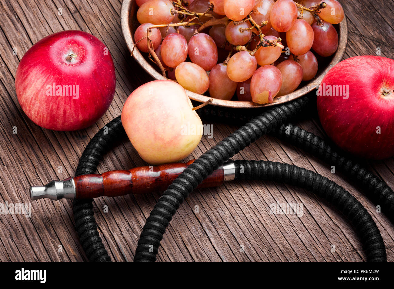 Arabian smoking hookah with taste of fruit mix of grapes and apples ...