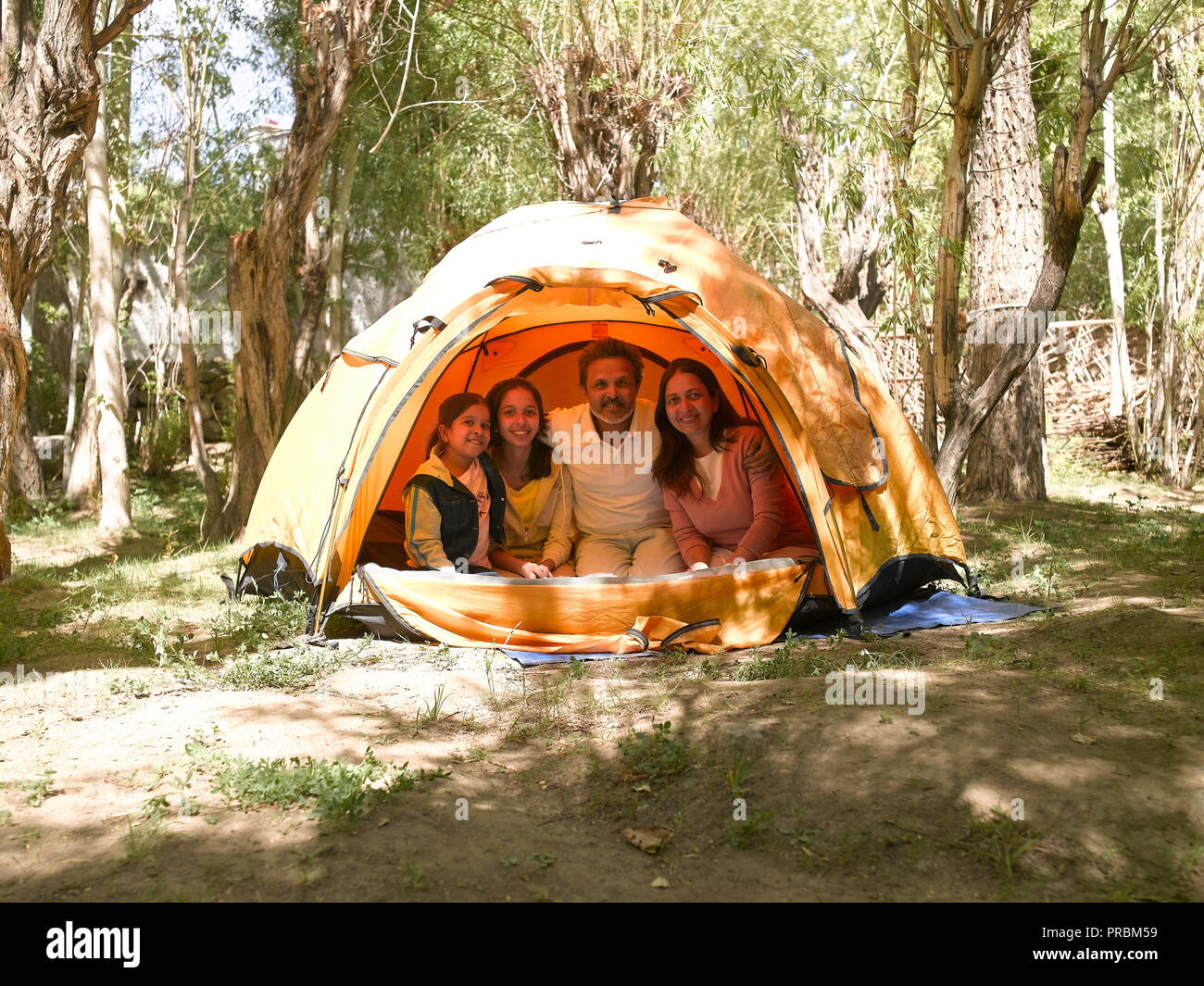 FAMILY OF FOUR IN A TENT, TENTED CAMPSITE, SABOO,LADAKH, JAMMU ...